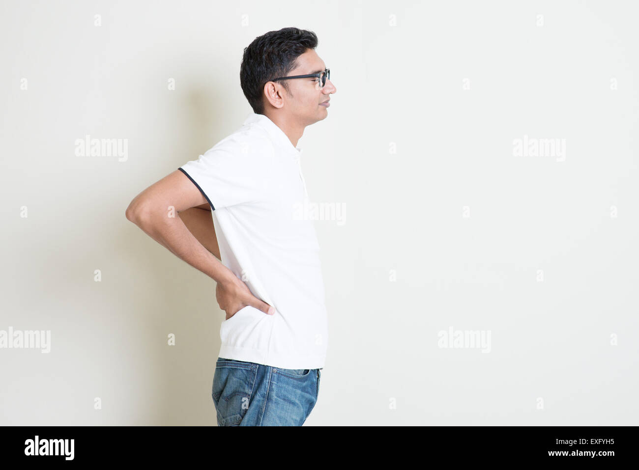 Hands on lower back hi-res stock photography and images - Alamy