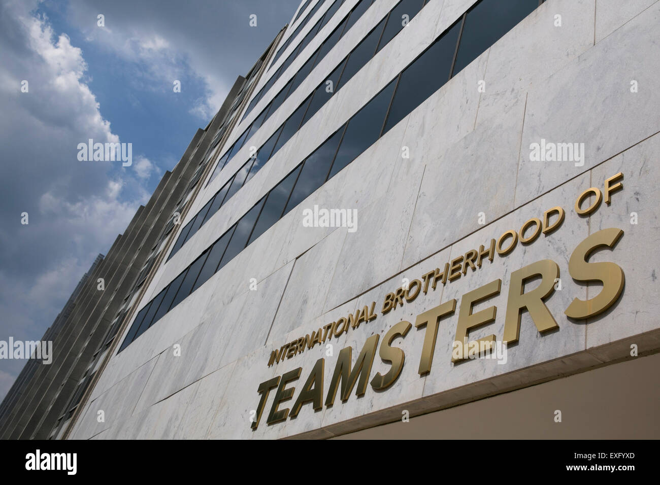 A logo sign outside of the headquarters of the International ...