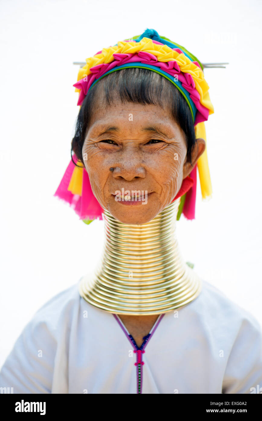 Older Kayan woman portrait on a white background in Chiang Mai ...
