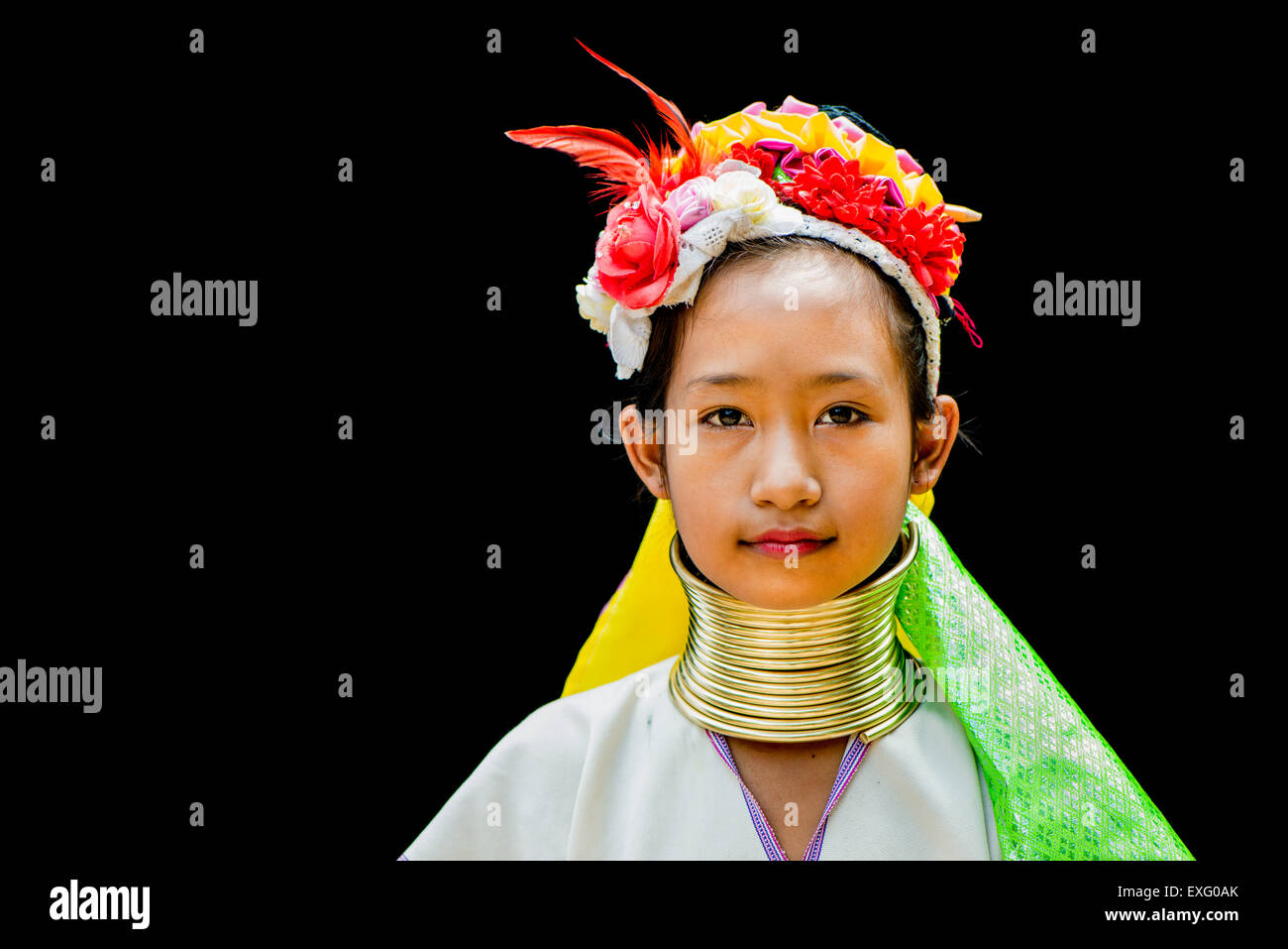 Young Kayan hill tribe girl with a black background in Chiang Mai ...