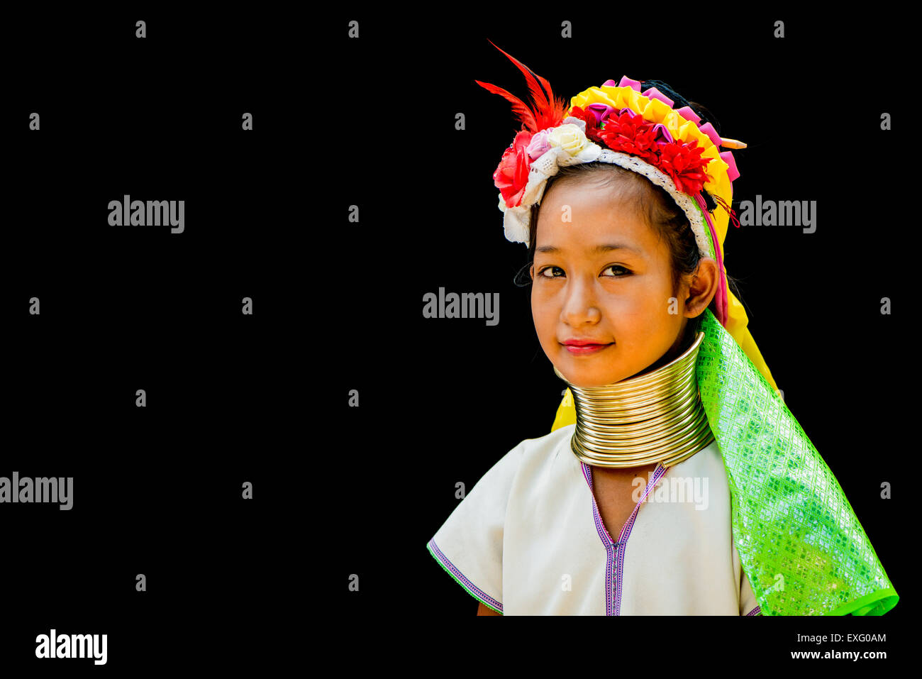 Young Kayan hill tribe girl with a black background in Chiang Mai ...