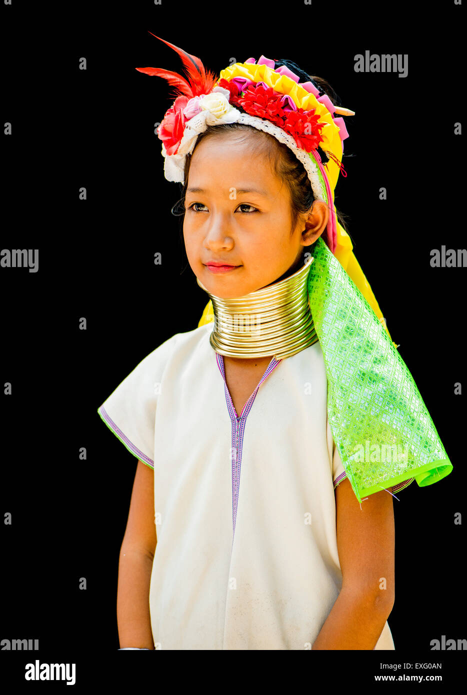Young Kayan hill tribe girl with a black background in Chiang Mai ...