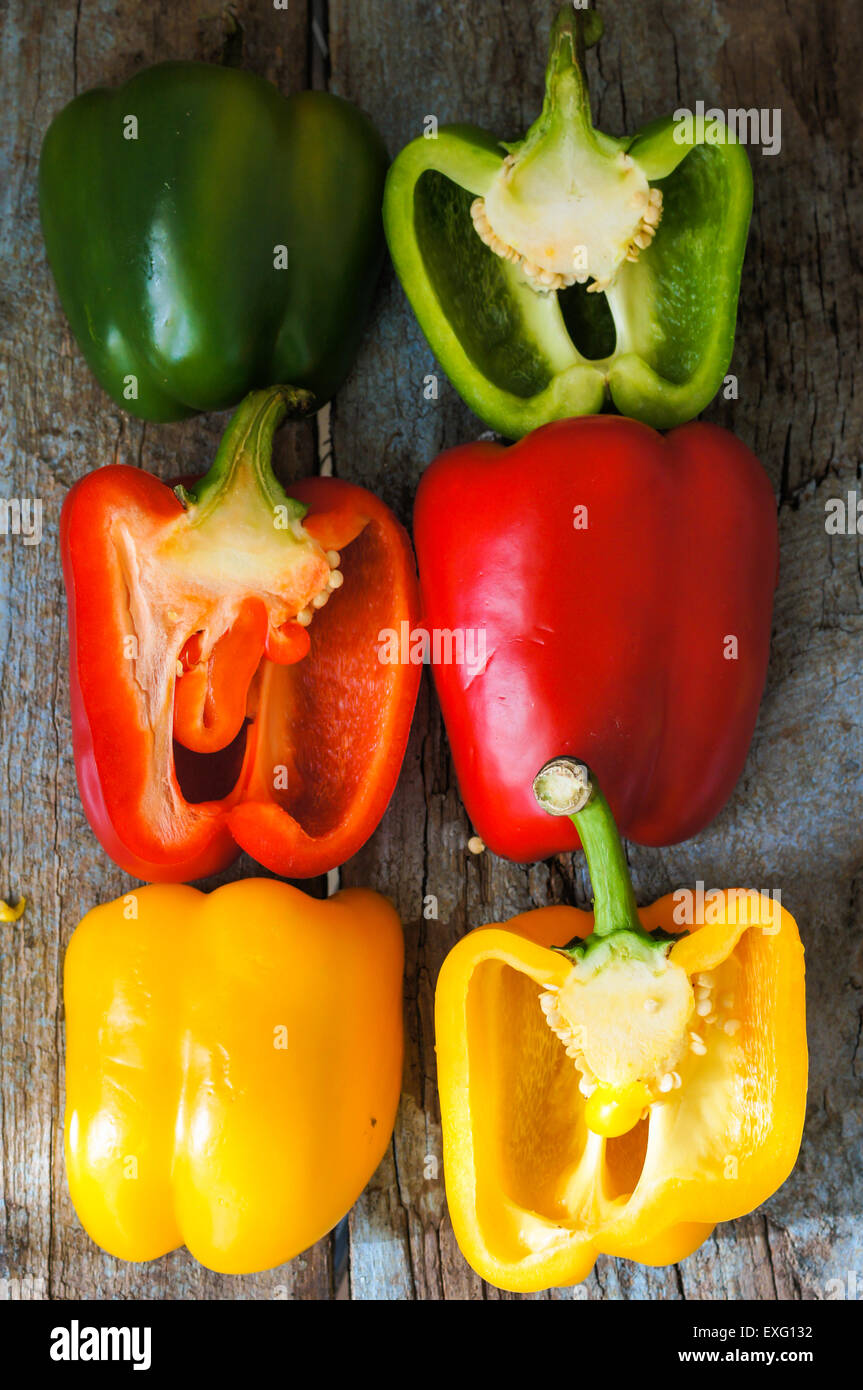Fresh vegetables, different colors of bell pepper on the wooden ...