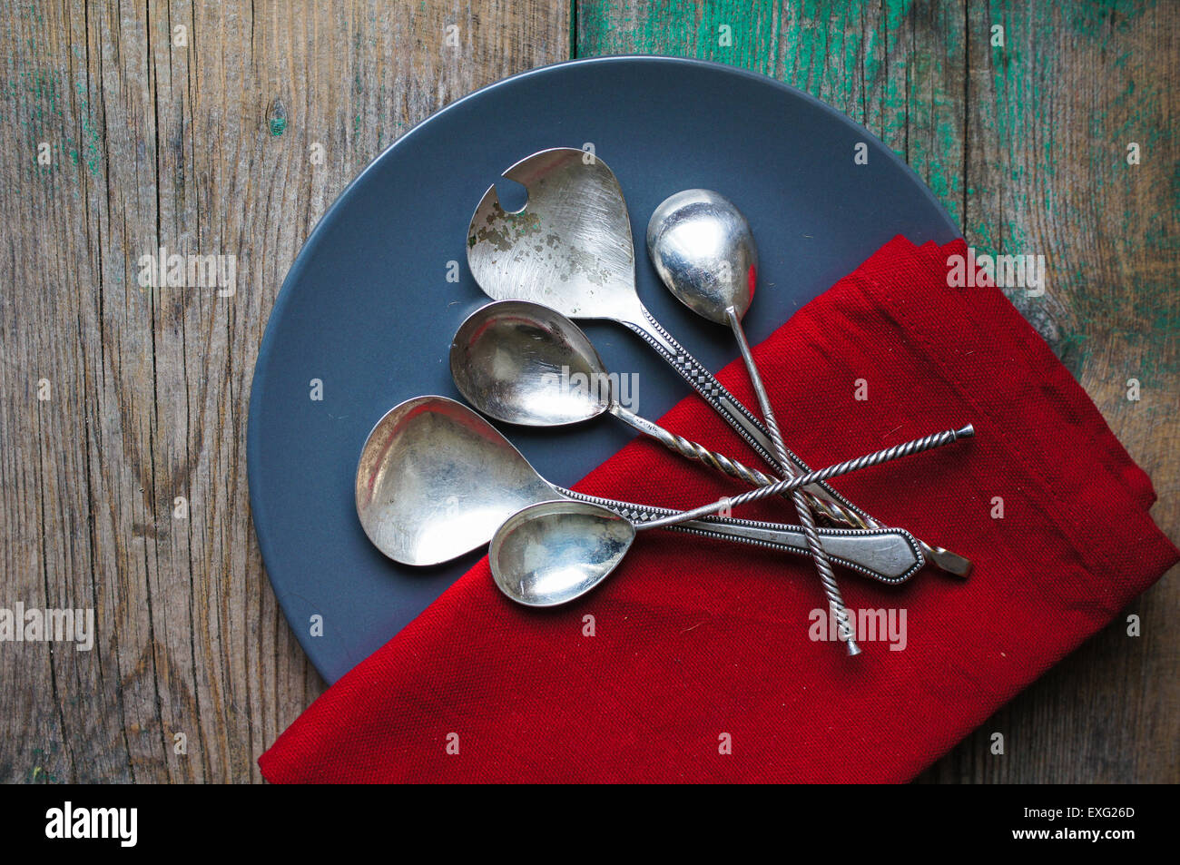 Vintage silverware on the old wooden table Stock Photo - Alamy