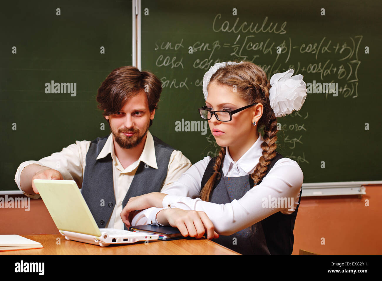 Back to school. Lesson calculus. The teacher conducts individual ...