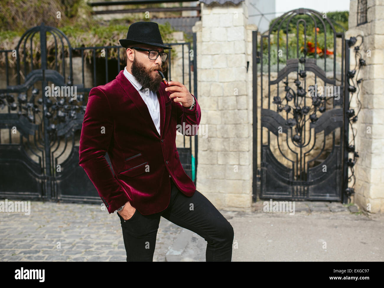 rich man in a jacket near his house Stock Photo - Alamy