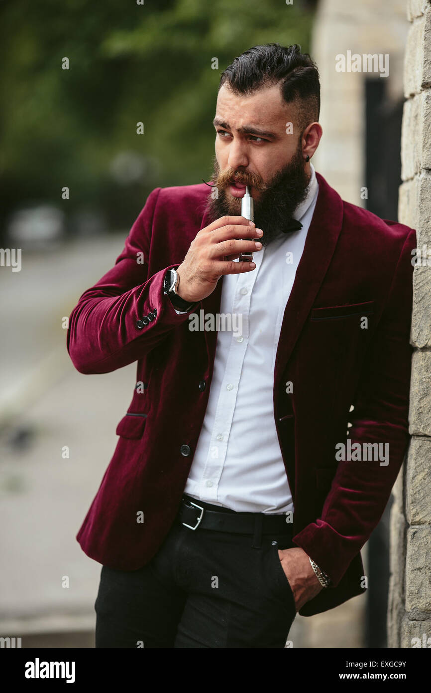 rich man in a jacket near his house Stock Photo - Alamy