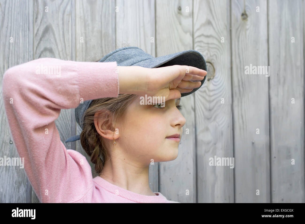 Girl Looking Into Distance Stock Photo - Alamy