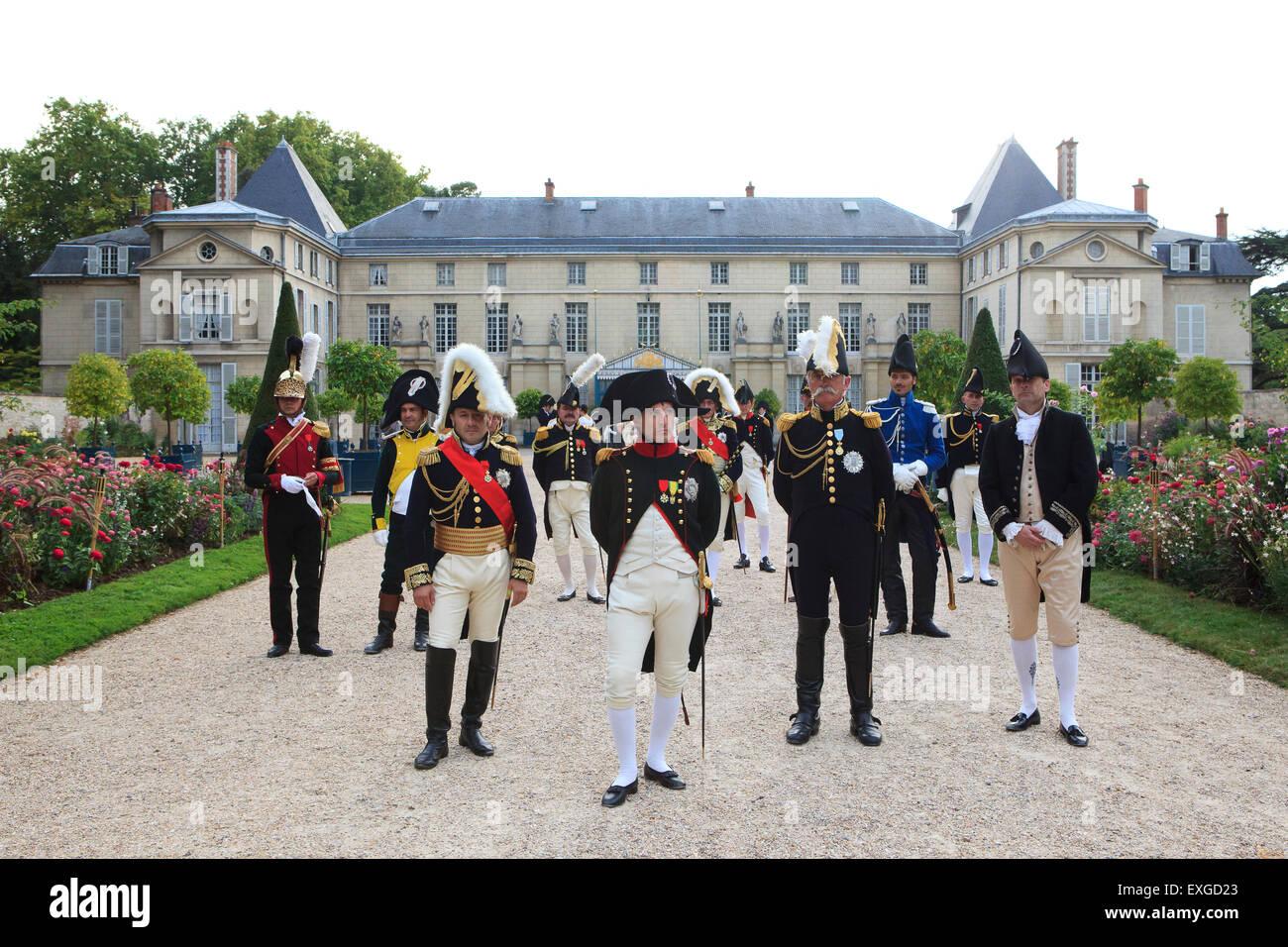 Napoleon Bonaparte posing with his officers in front of his private ...