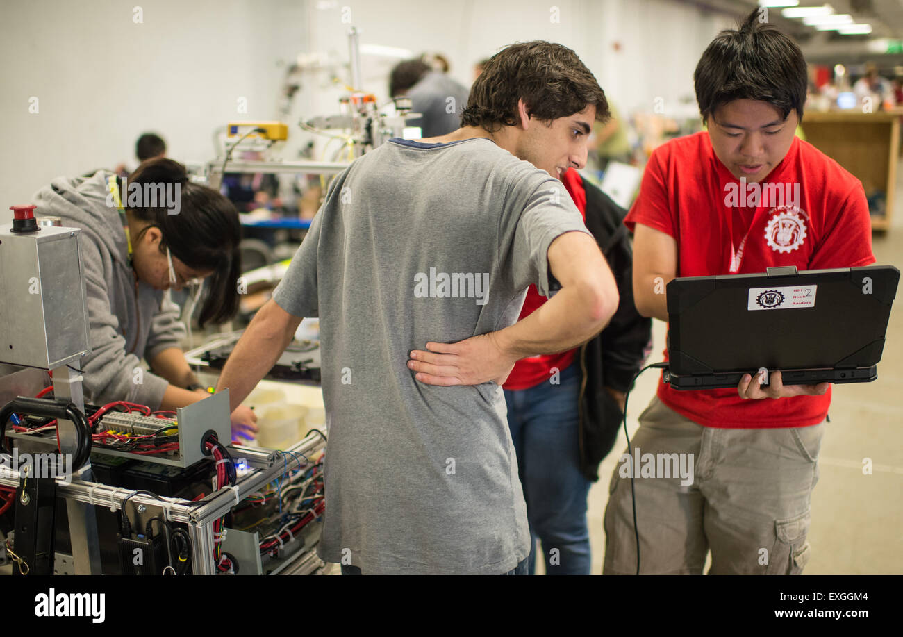 The RPI Rock Raiders team prepares their robot for the 2015 Sample ...