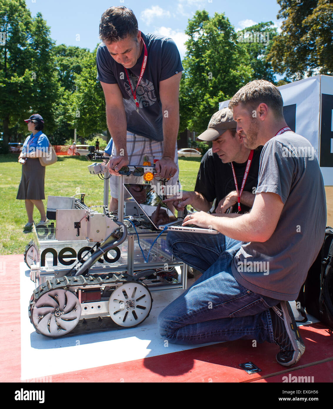 Members of the Army of Angry Robots team prepare their robot to attempt ...