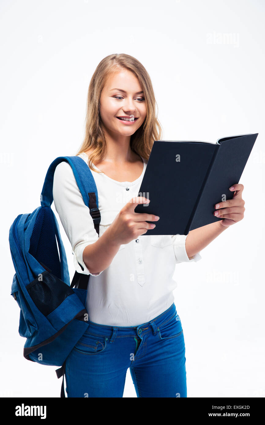 Happy female student reading book isolated on a white background Stock ...