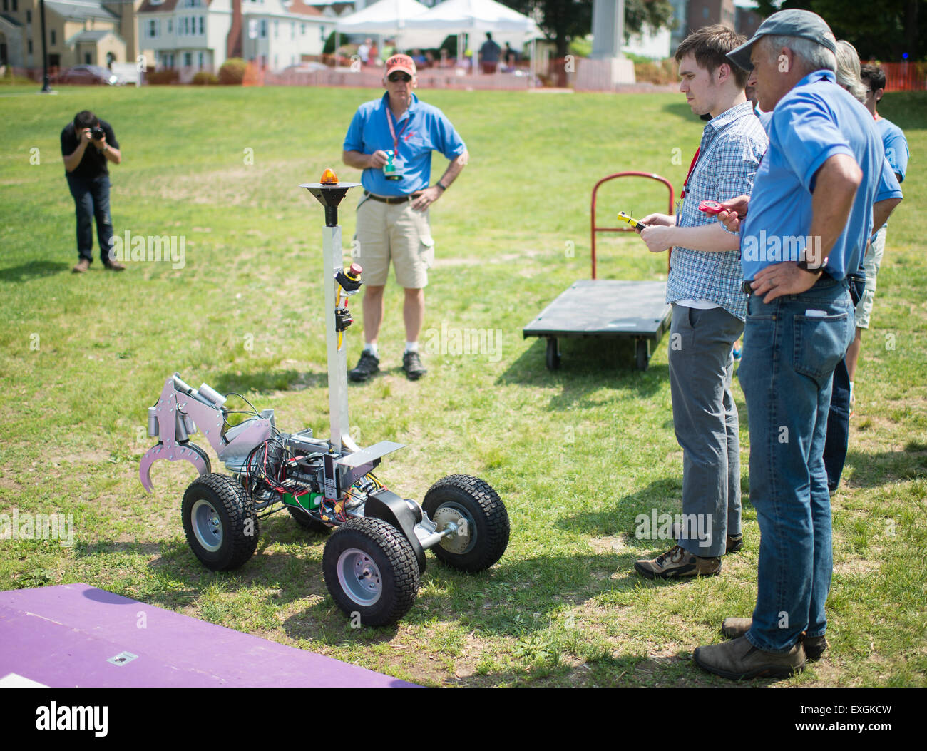 James Lepore of team Gather prepares a robot for the 2015 Sample Return ...