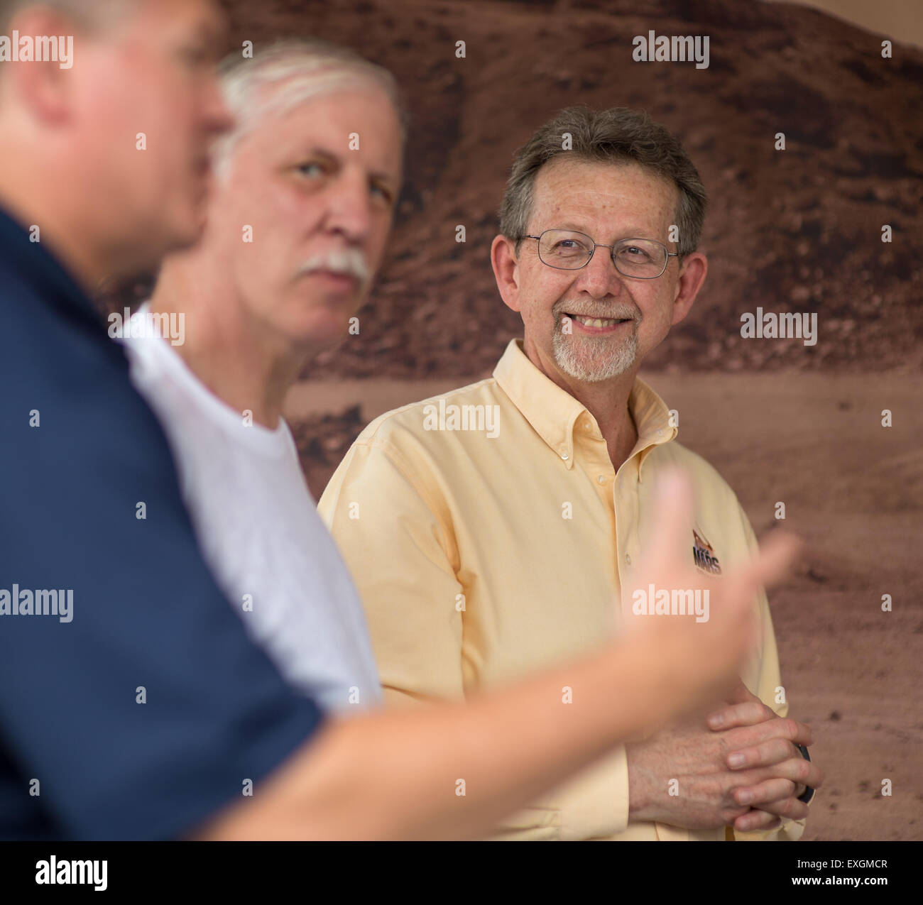 NASA’s Director of Planetary Science Jim Green, right, listens as Mike ...