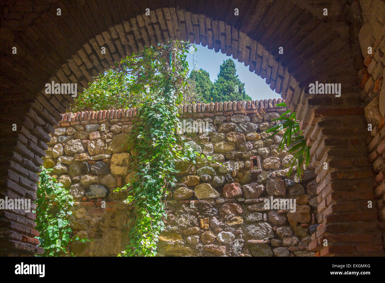 Ancient brick passageway door in the famous La Alcazaba in Malaga Spain ...