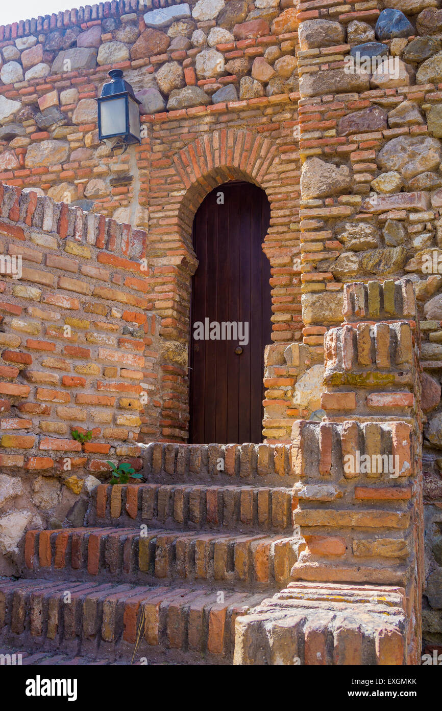 Ancient brick passageway door in the famous La Alcazaba in Malaga Spain ...