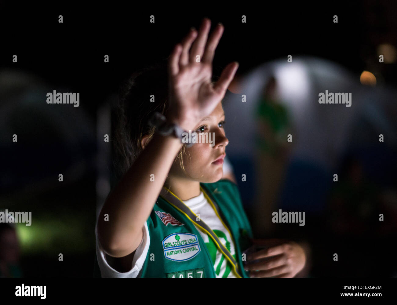 A Girl Scout raises her hand to ask a question at the first-ever White ...
