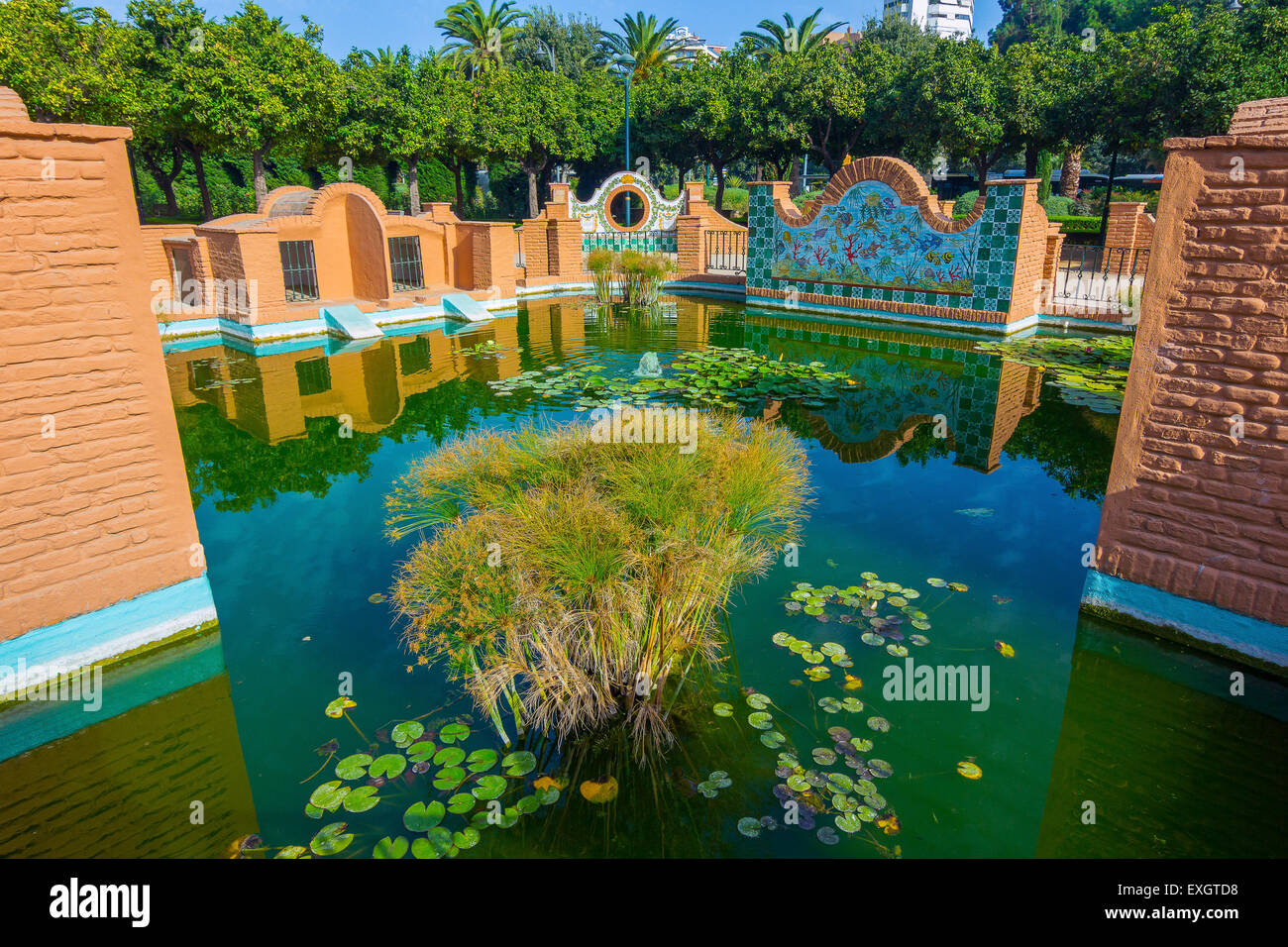 Andalusian style nice pond in the park of Malaga, Spain Stock Photo - Alamy