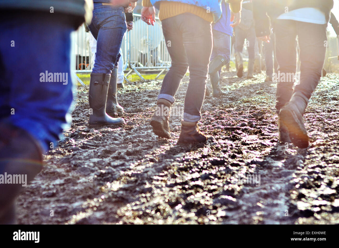 Spectators wearing muddy boots at a cyclocross event Stock Photo - Alamy