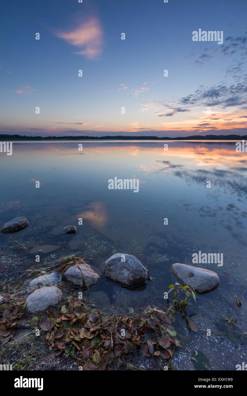 Beautiful summer sunset over lake in Poland. Mazury lake district in ...