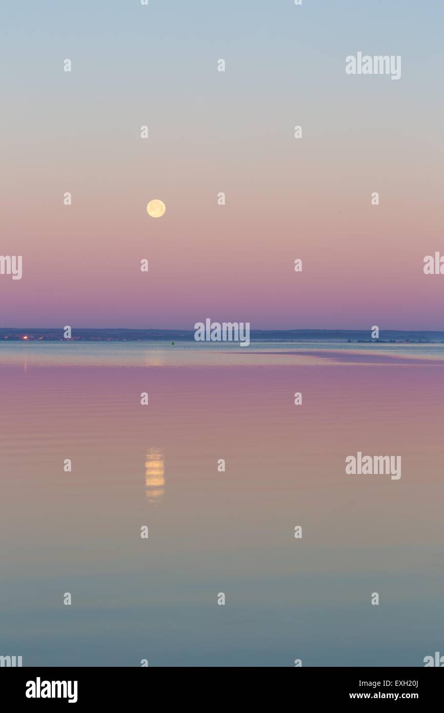 Beautiful before sunrise landscape of Gdanska Bay with setting moon ...