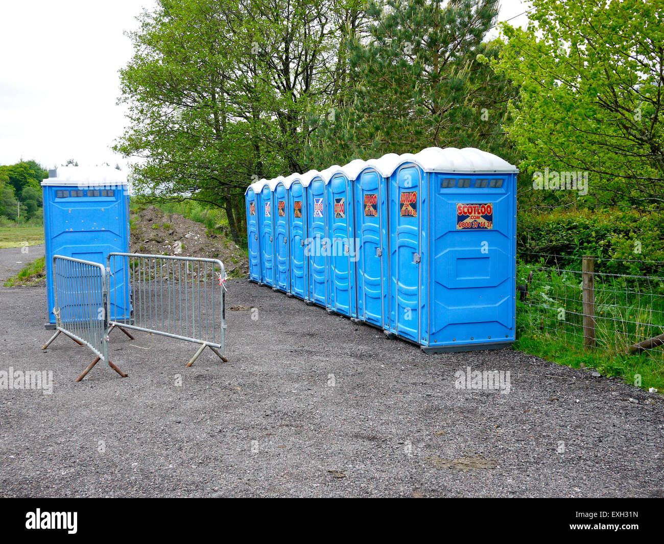 A Row of portable toilets, Scotland, UK Stock Photo - Alamy