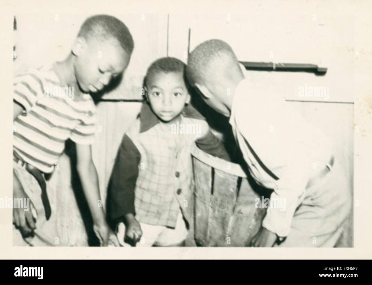 At Camp Ebenezer, African American boys participate in gathering eggs ...