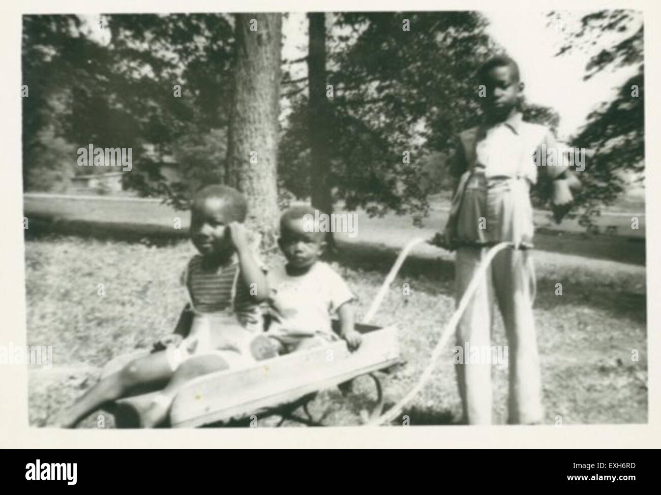 Camp Ebenezer Three Children with Wagon Stock Photo - Alamy