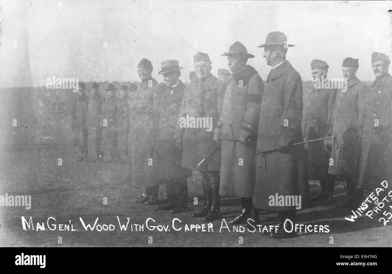 This photograph shows Major General Wood alongside Governor Capper ...