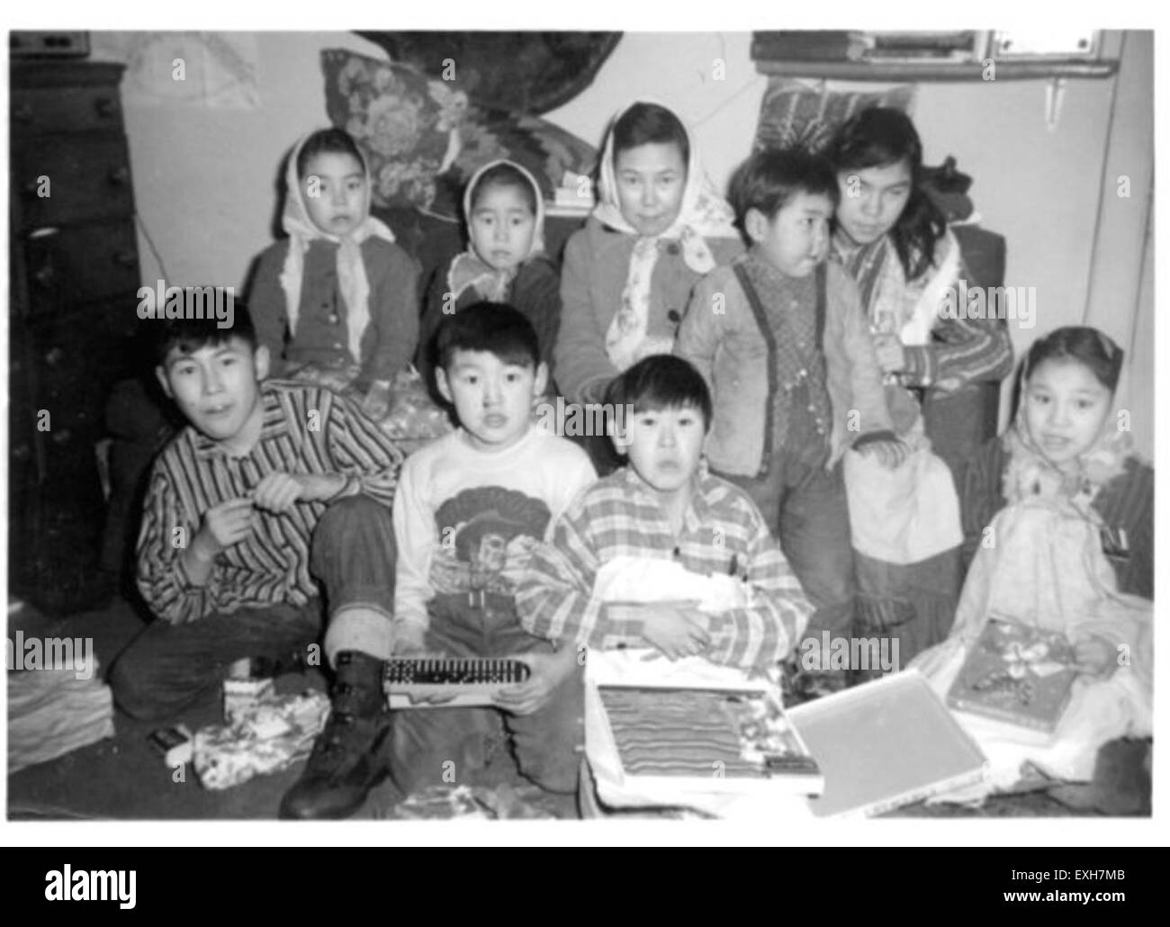 Children celebrating Christmas Day, participating in holiday traditions ...