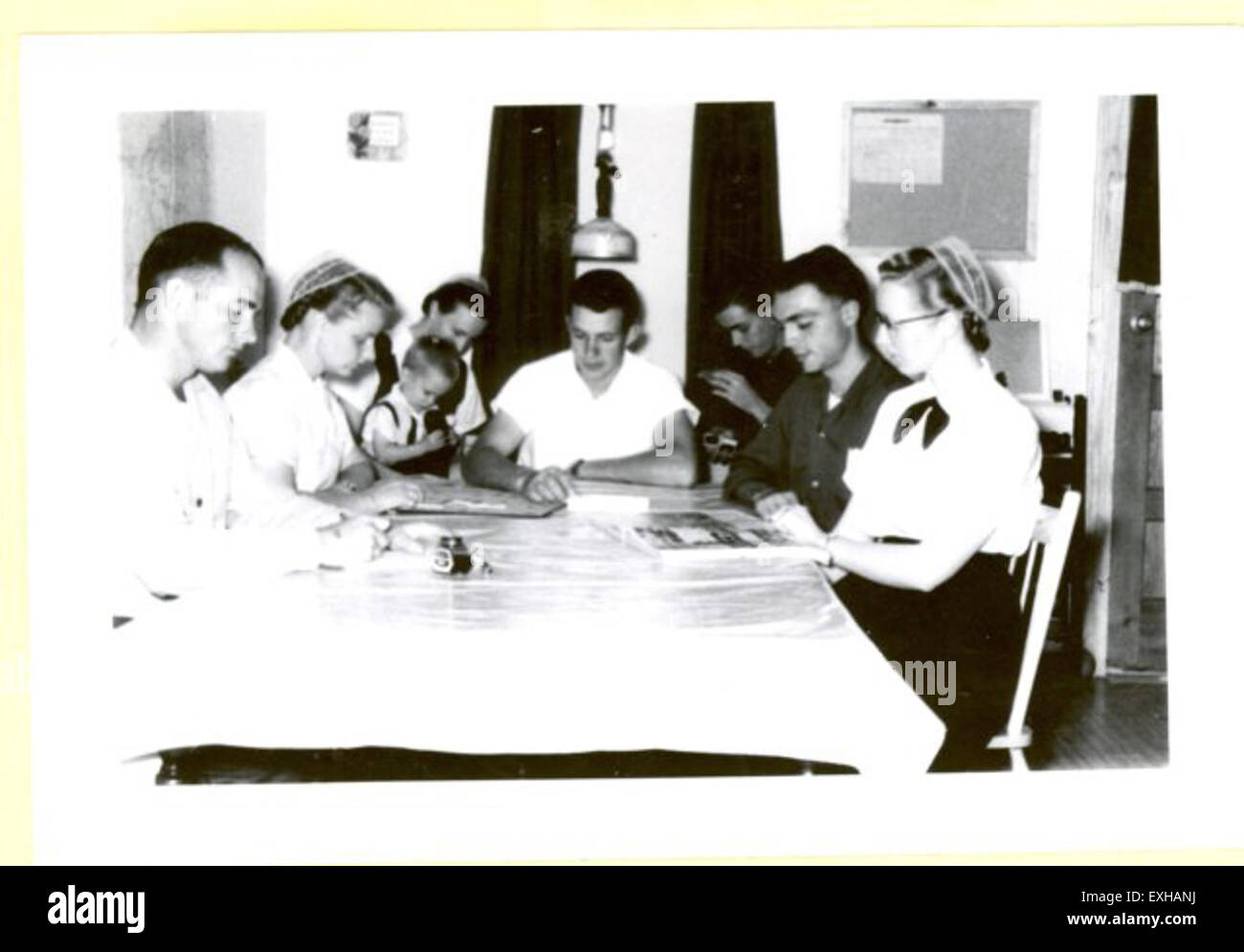 This photograph captures a dinner gathering in Calling Lake, Alberta ...