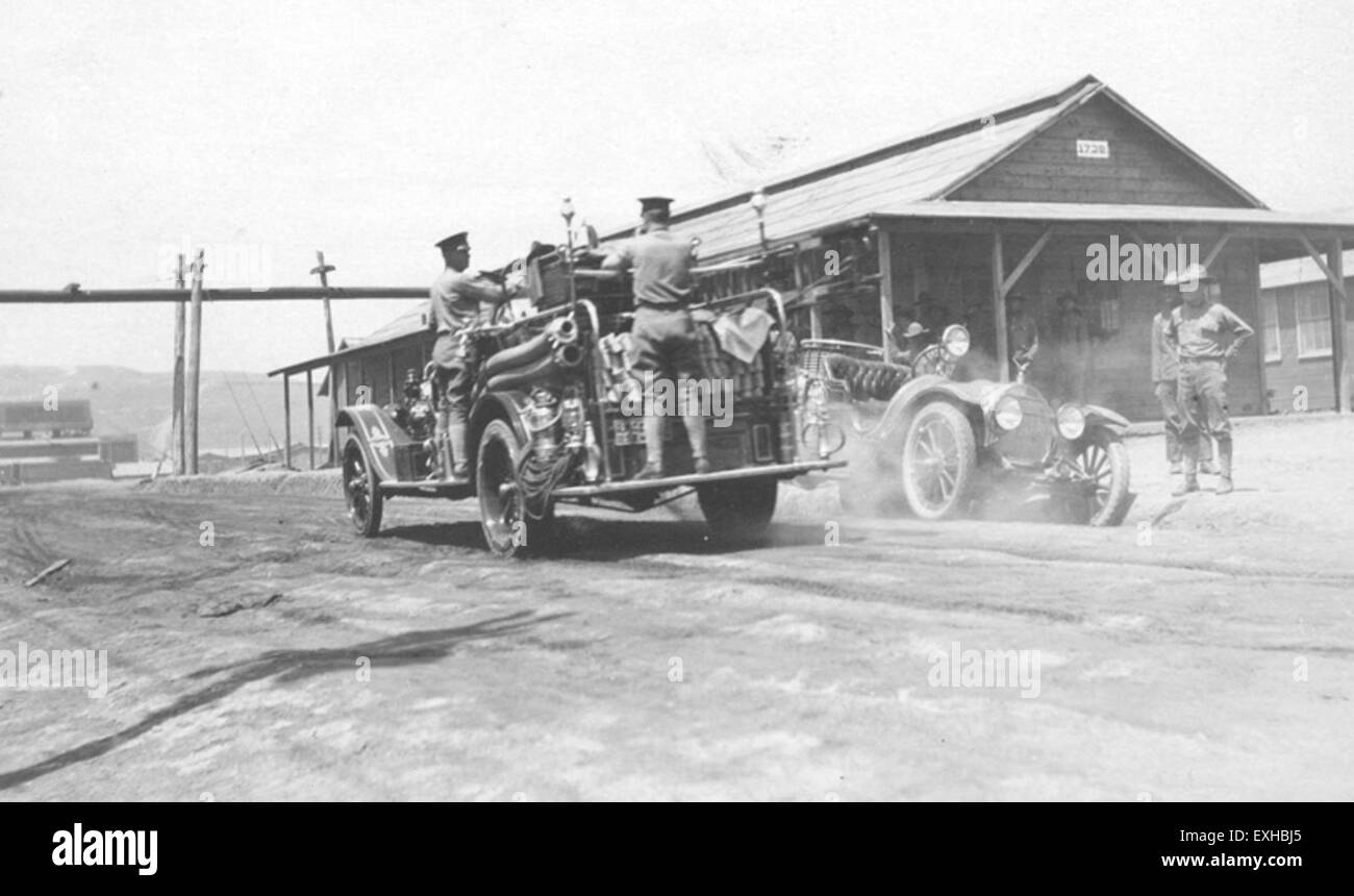 This photograph shows a fire engine in motion at Camp Funston, likely ...
