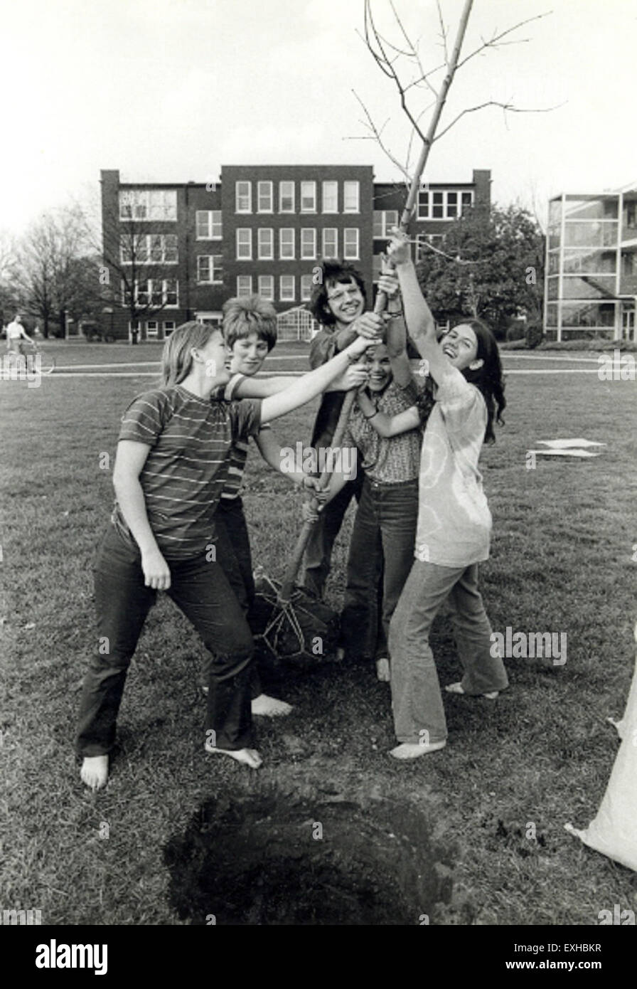 Five Students Planting A Tree Stock Photo - Alamy