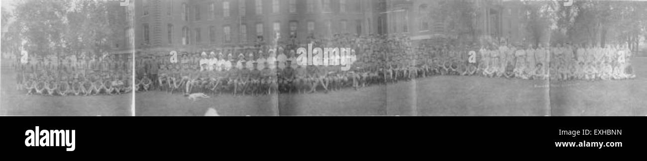 The image shows workers at Fort Riley, a military base in Kansas ...
