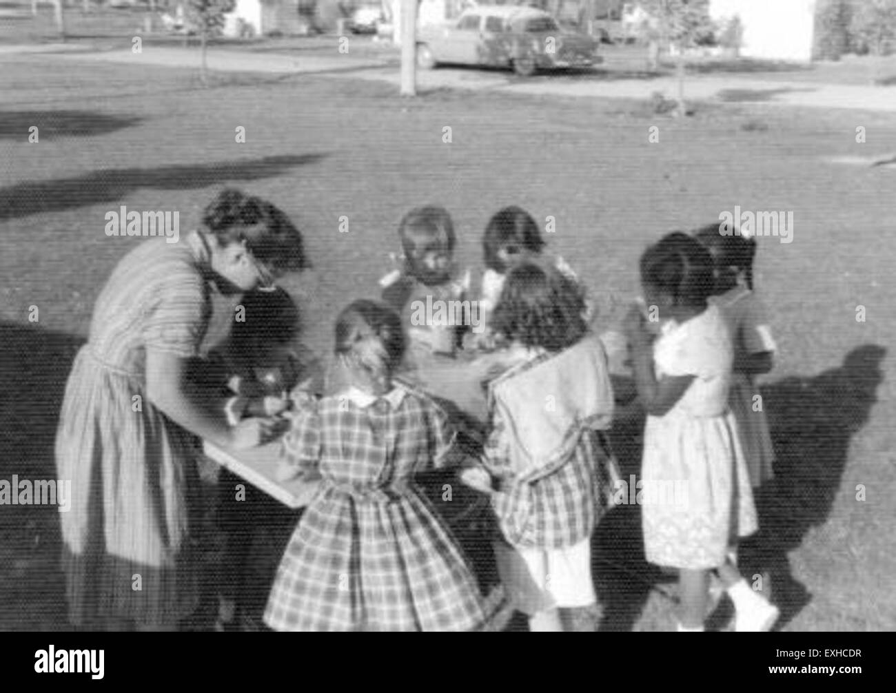 The image shows a girls' club in Phoenix, Arizona, with Lillian Amstutz ...