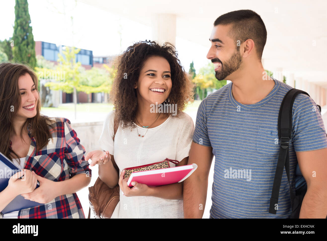 Group of students walking in University Campus Stock Photo - Alamy