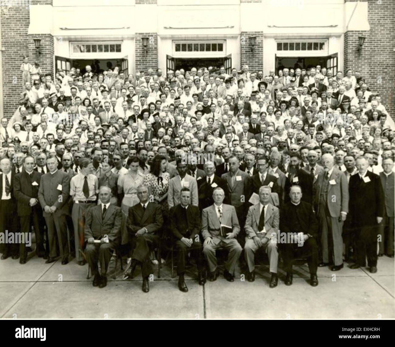 A group portrait features members of the Mennonite Central Committee ...