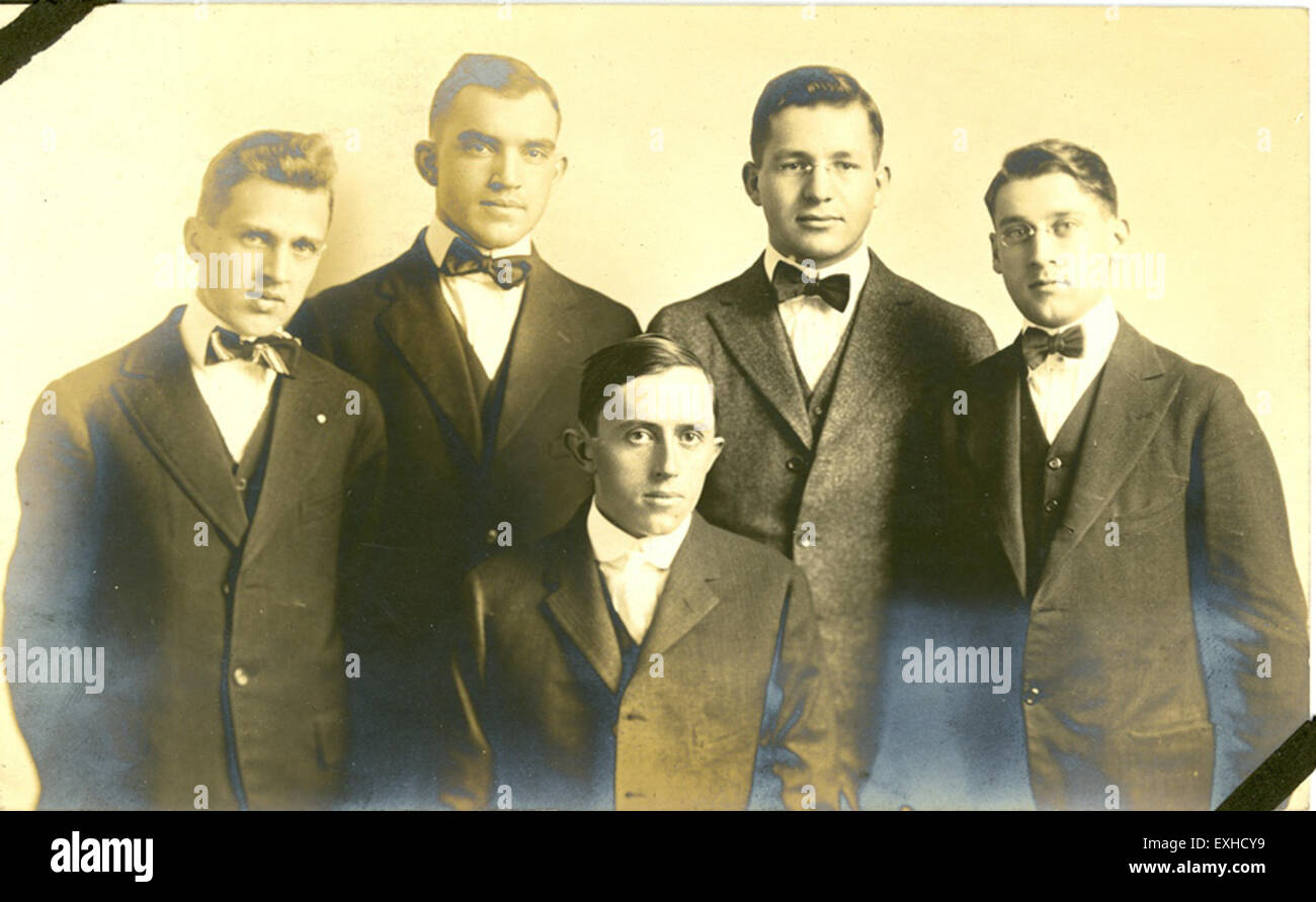 A group portrait featuring E. Ernest Miller, likely showing a gathering ...