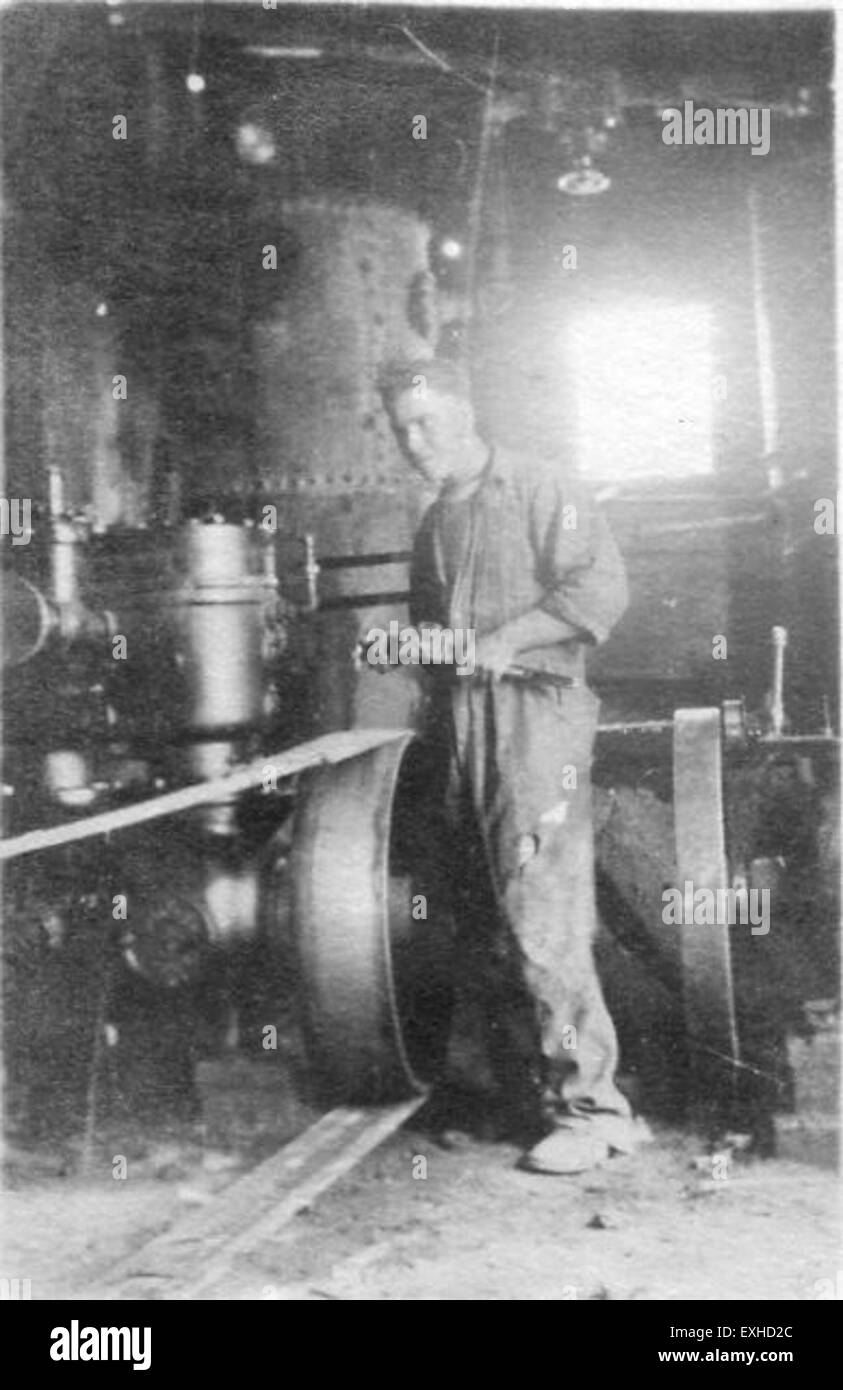 This image shows an individual, likely involved in hard physical labor ...