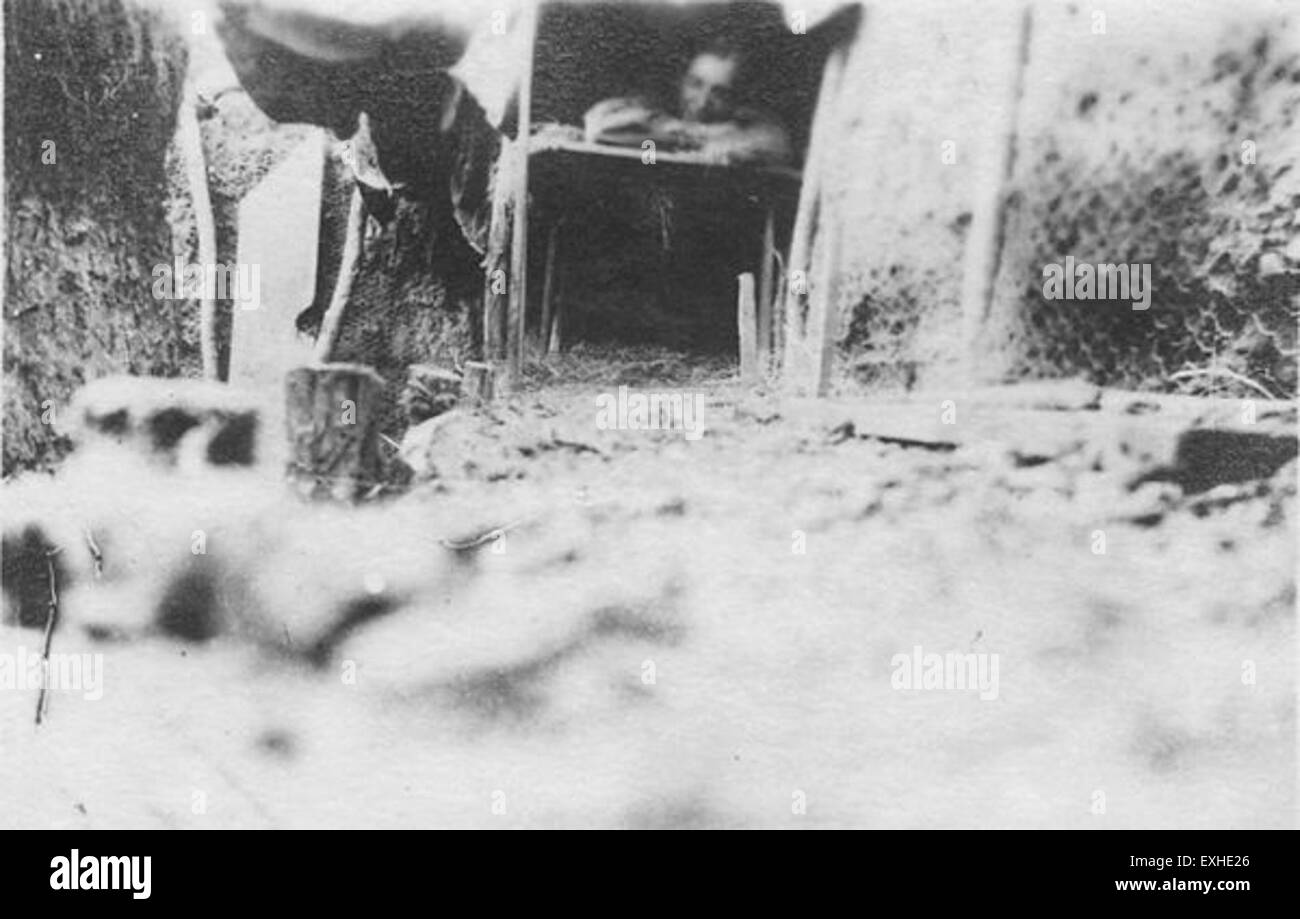 A moment of rest in the trenches, depicting soldiers taking a brief ...