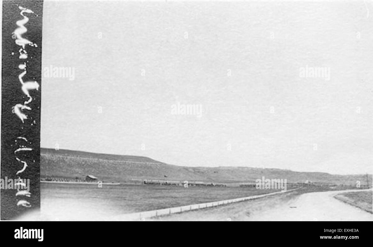 An infantry drill and rifle range are depicted, showing military ...