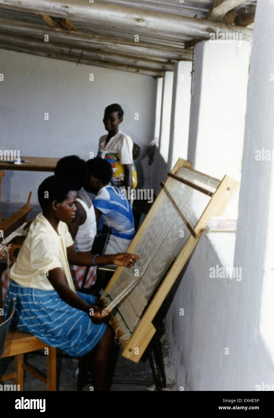 Mary Attard, an IVS volunteer, is pictured weaving at the Christian ...