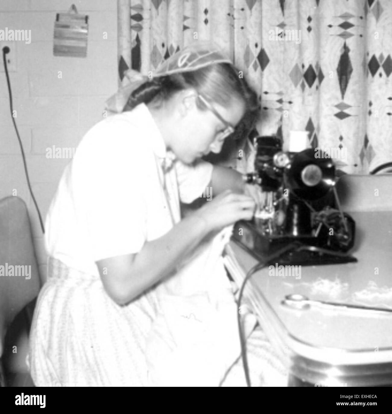 Janet Yoder is shown sewing in Stanfield, Arizona, in a Mennonite ...