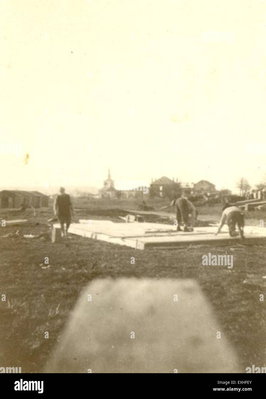 This image shows Jacob Conrad Meyer laying the floor during ...