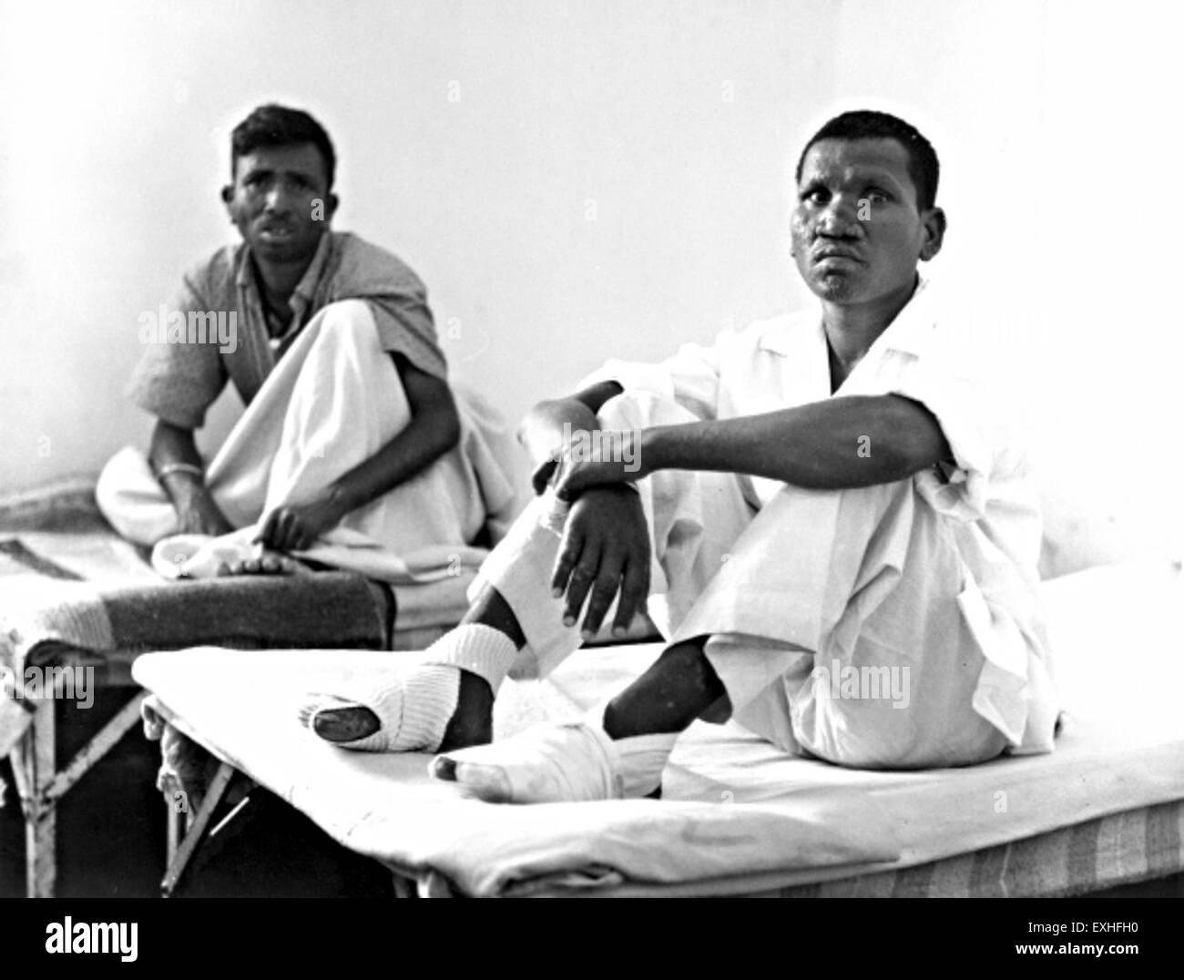 The photograph shows leper patients in Shantipur, India, where ...