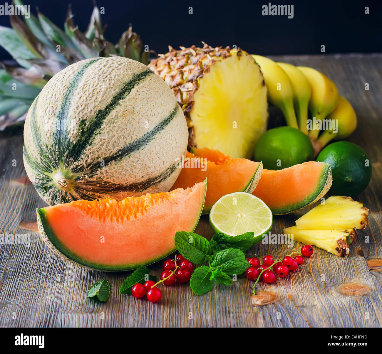 Fresh healthy tropical fruits, melon, pineapple, berries. Summer food ...