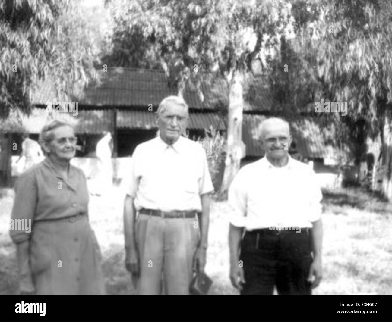 This historical photo captures Mae Hershey, J.W. Shank, and Aaron Mast ...