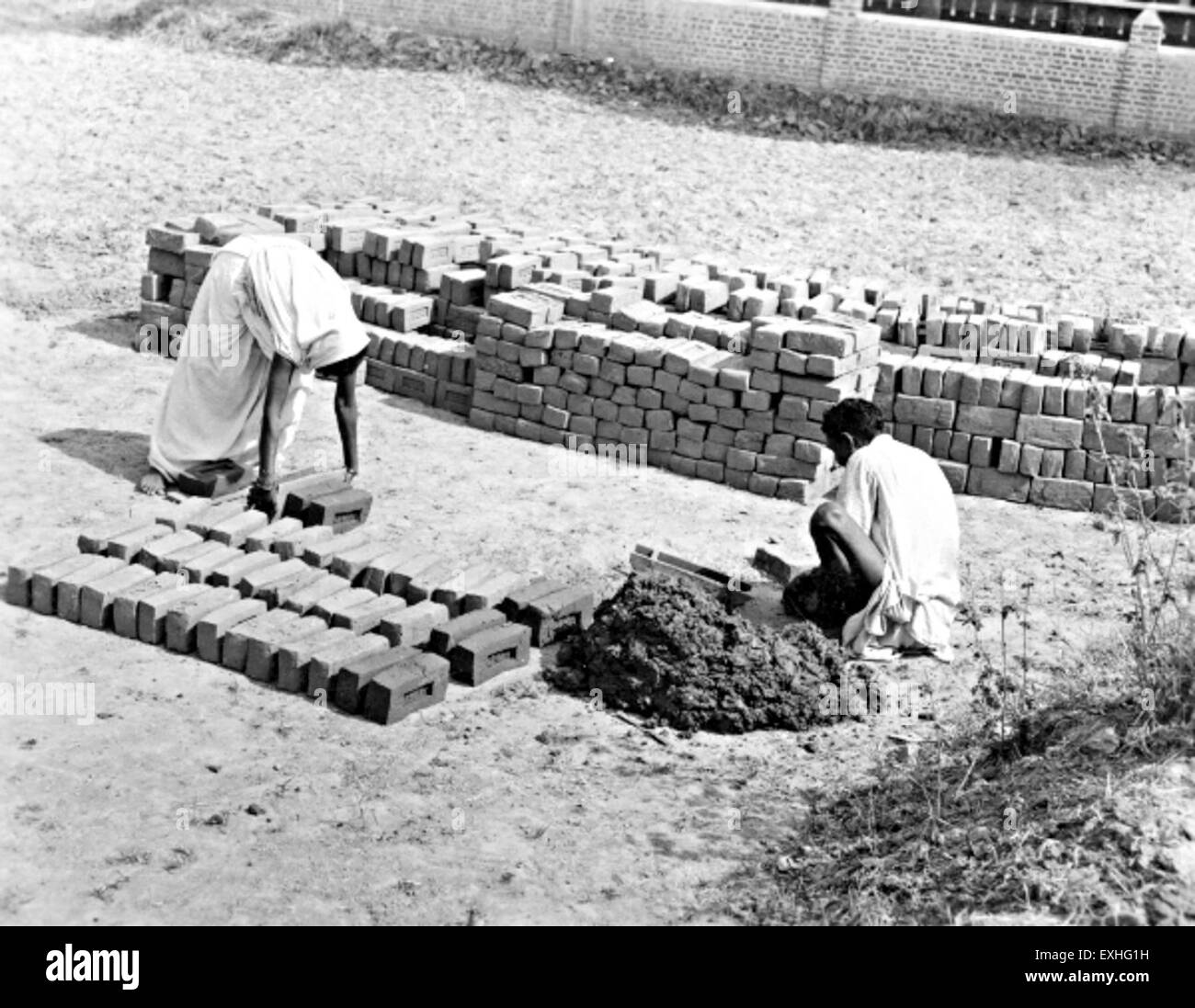 This photograph from 1952 captures brickmakers at work in Dhamtari ...