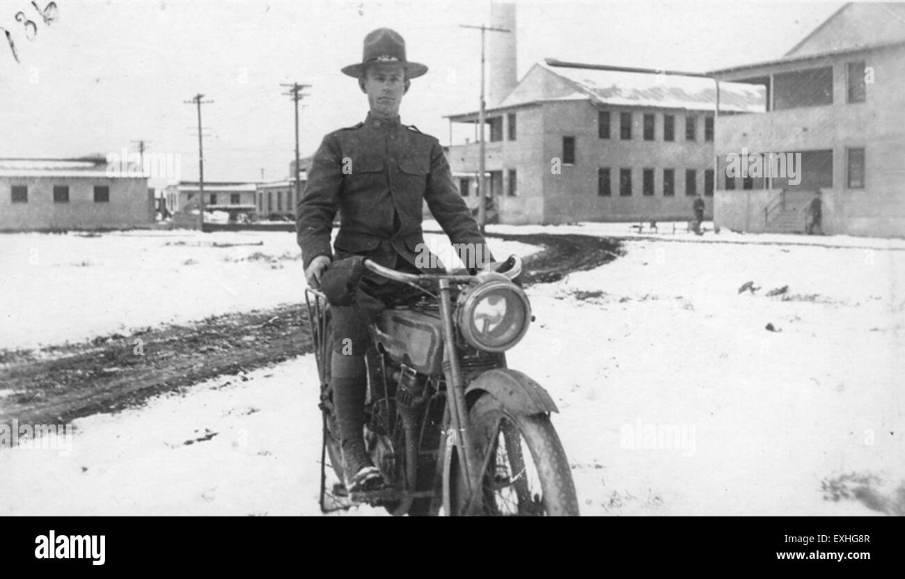 This image captures a man riding a motorcycle, symbolizing freedom and ...