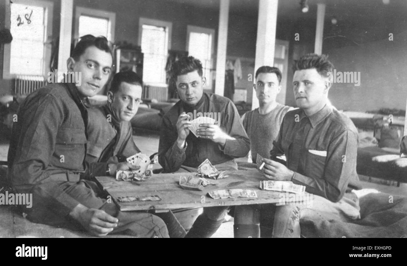 Old men playing cards at table hi-res stock photography and images - Alamy